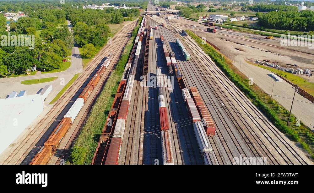 Looking down on railroad rail yard, many trains, tracks Stock Video ...
