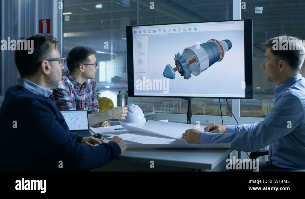 Team of Industrial Engineers Discuss 3D Model of Turbine/Engine Design ...