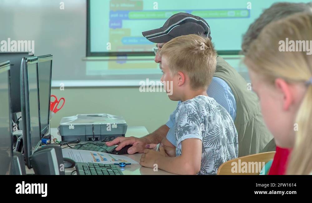 Two different generations are working in computer lounge Stock Video ...
