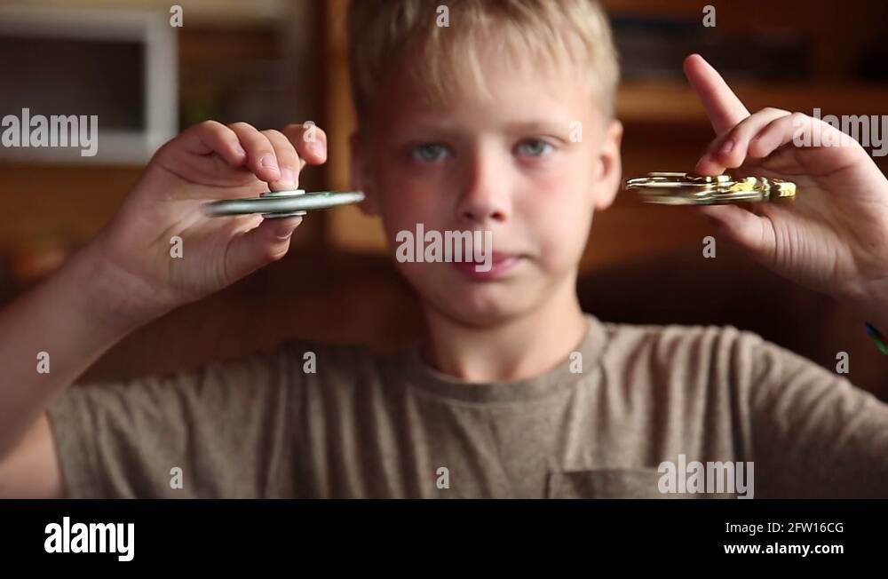 Hand toy spinner Stock Videos & Footage - HD and 4K Video Clips - Alamy