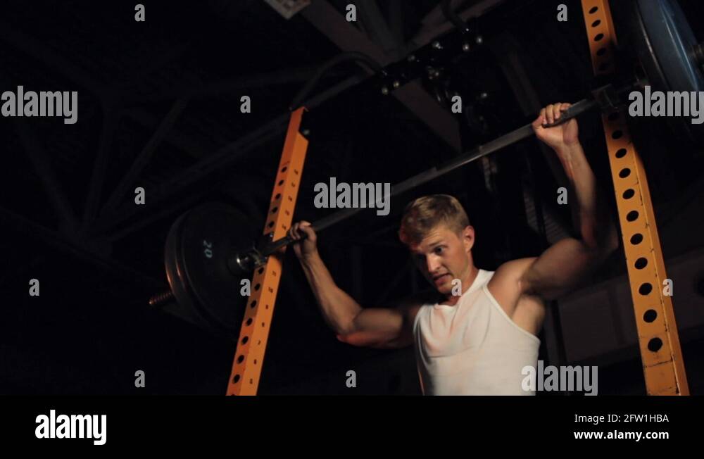 Man squatting gym Stock Videos & Footage - HD and 4K Video Clips - Alamy