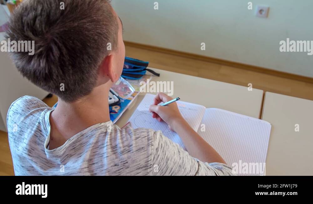 Student is drawing a straight line in his math class Stock Video ...