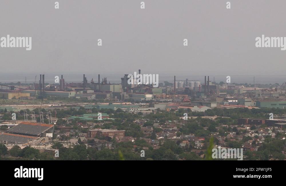 Industrial city with factories and manufacturing plants and heavy ...