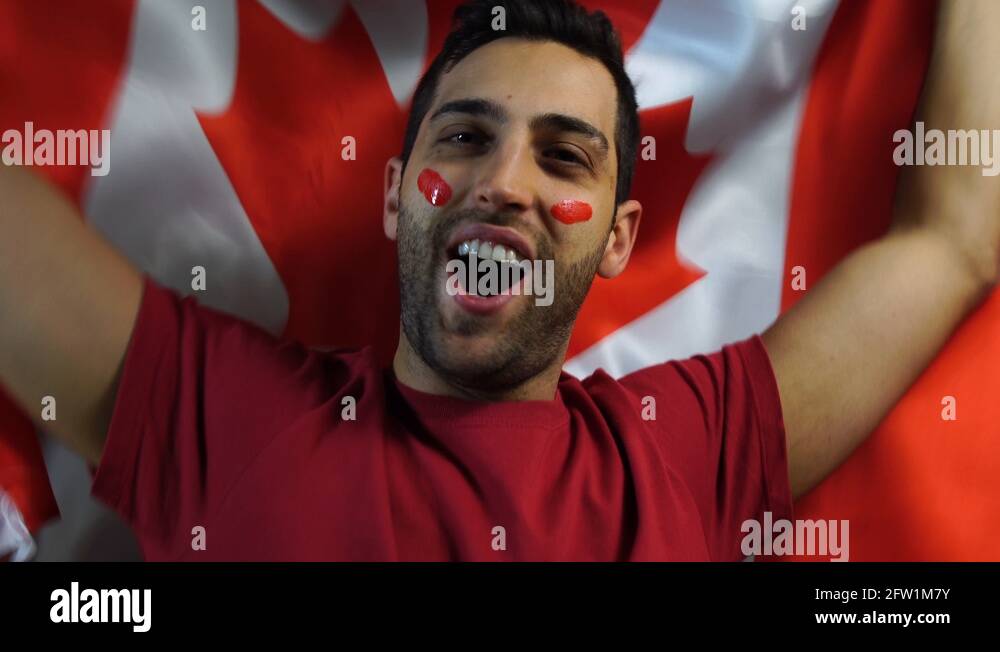 Canadian Guy Celebrating with Canada Flag Stock Video Footage - Alamy
