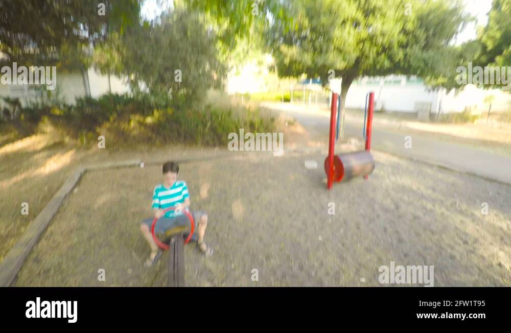Seesaw teeter totter Stock Videos & Footage - HD and 4K Video Clips - Alamy