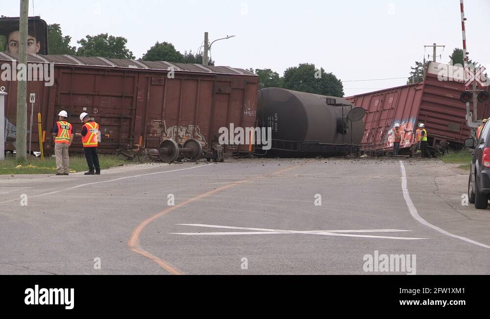 Freight and chemical tanker train derailment in middle of small town ...