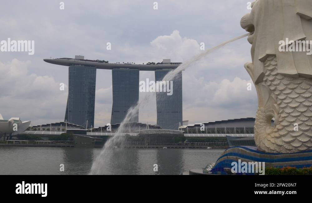 singapore rainy day merlion fountain marina bay sands hotel panorama 4k ...