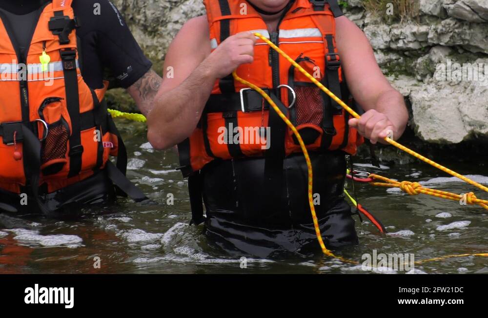 Men in wetsuits Stock Videos & Footage - HD and 4K Video Clips - Alamy