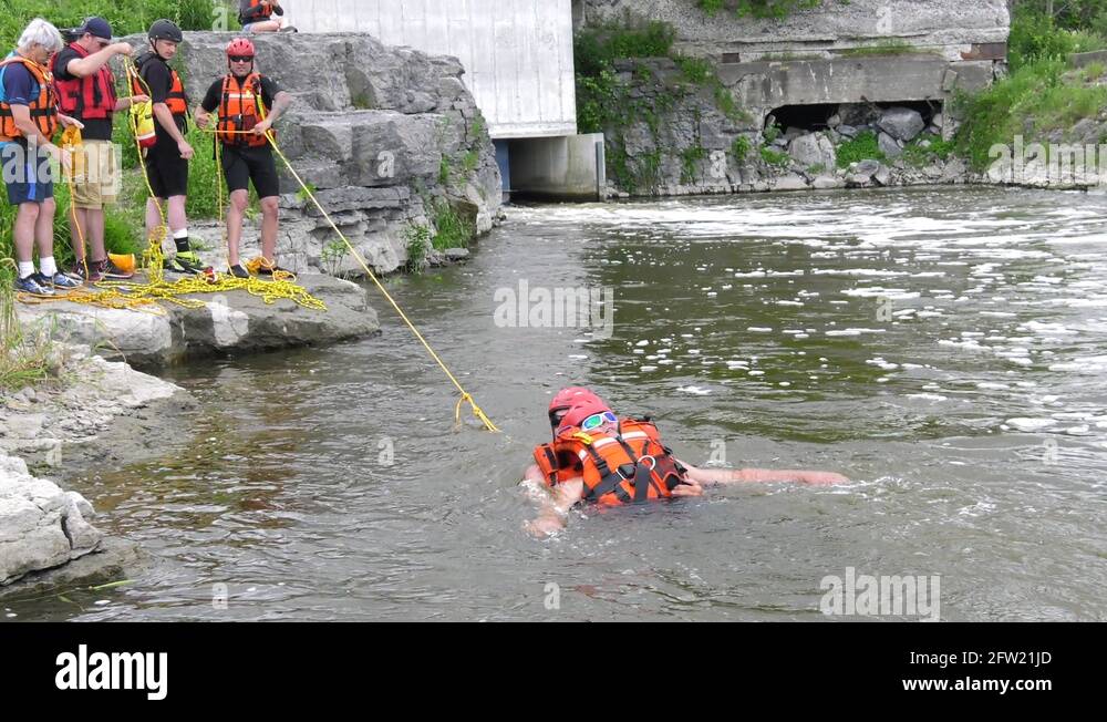 water rescue practice reeling in rescuer and victim 4k Stock Video ...
