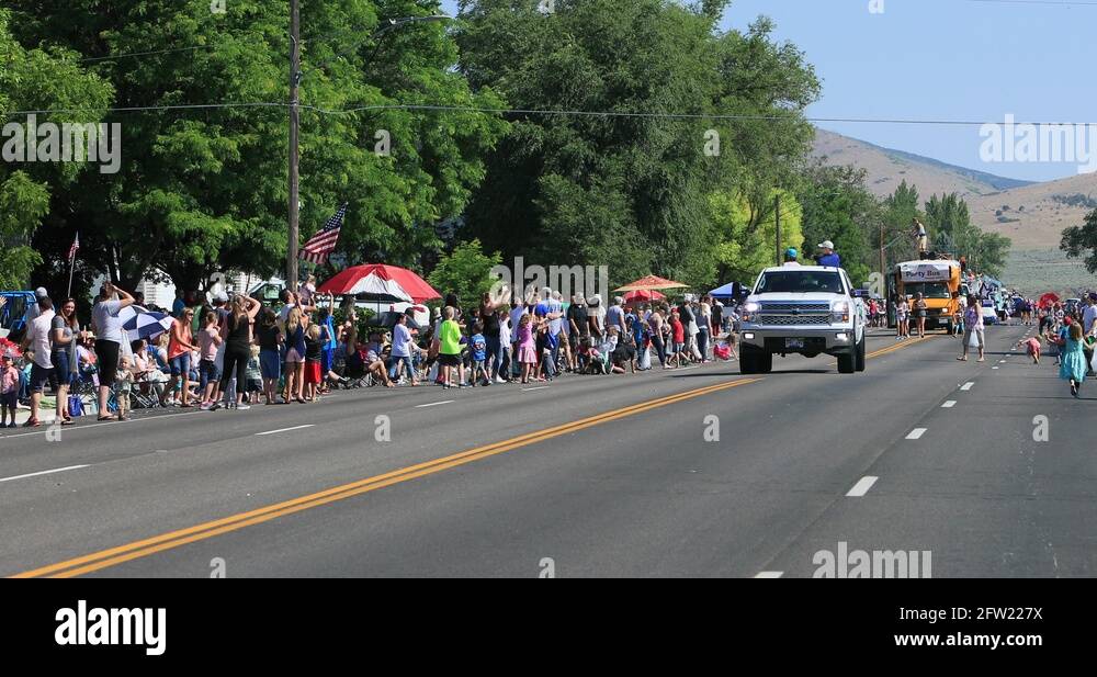 Rural community celebration parade throwing candy to kids 4K Stock ...