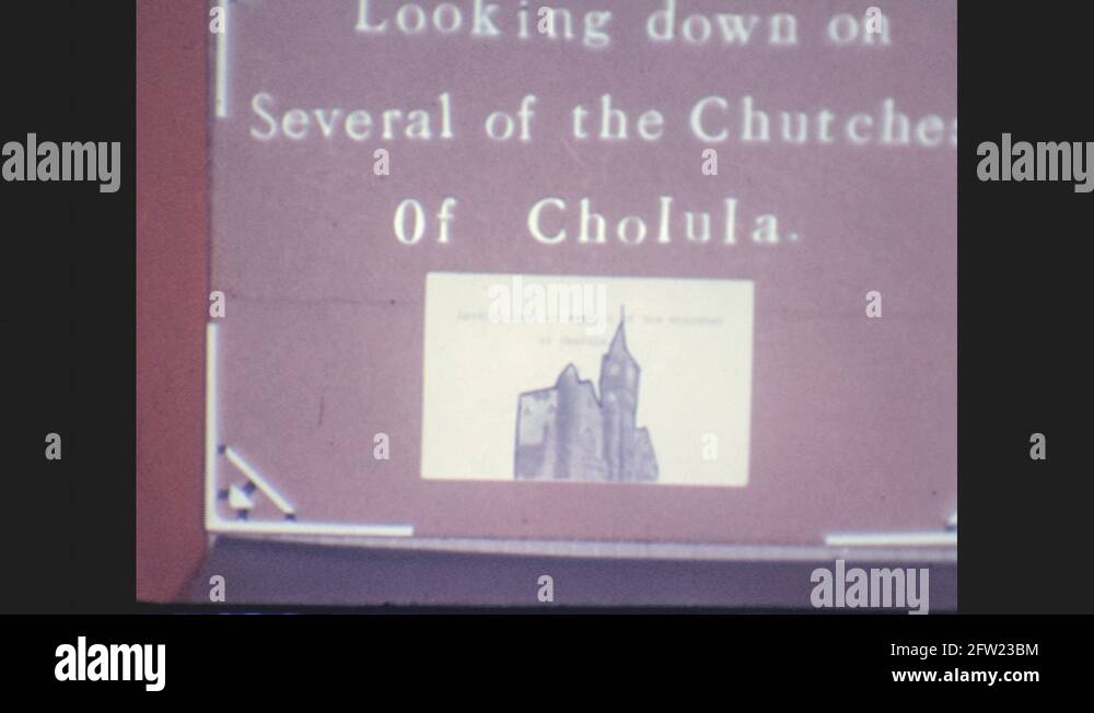 1930s: Sign marks site for view of historic churches of Cholula. Men ...