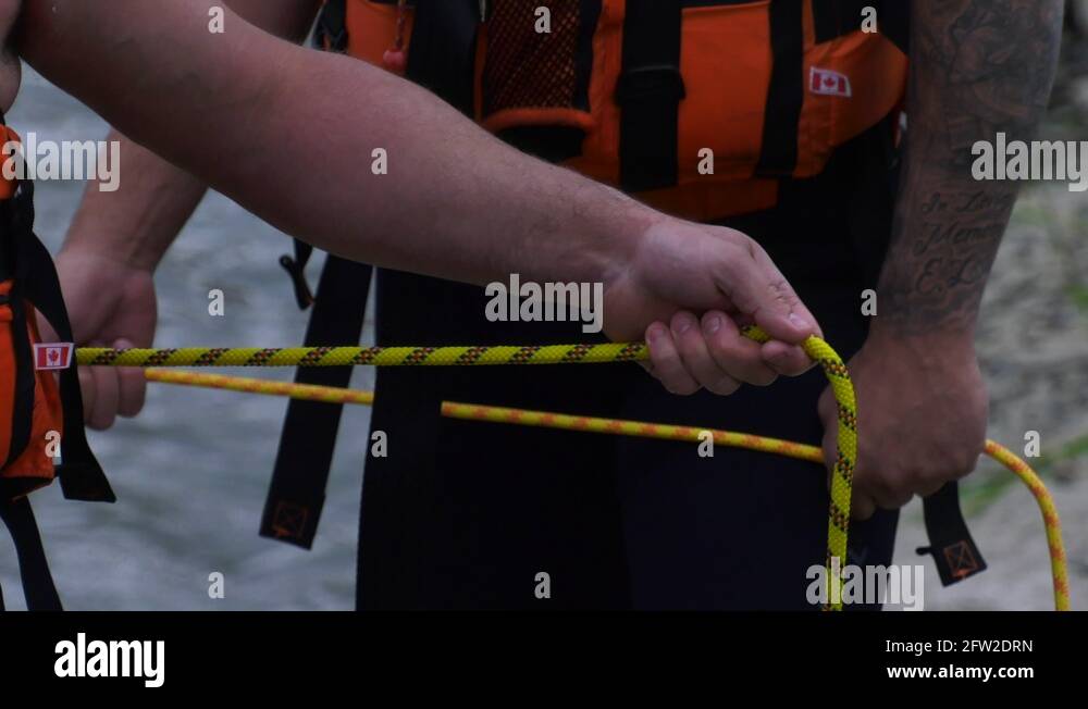 water rescue sliding rope through hands 4k Stock Video Footage - Alamy