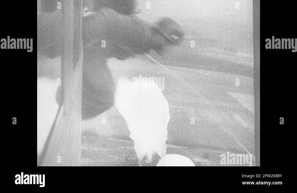 1940s: Soldiers jump out of airplanes, deploy parachutes. Bomb ...