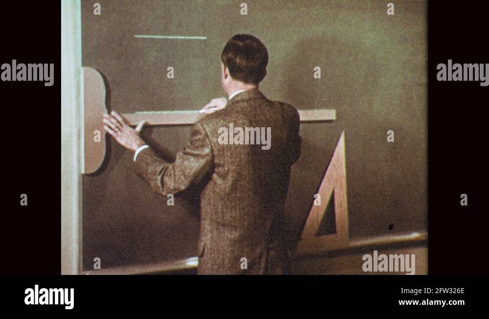 1950s: Man draws line on chalkboard using T-Square. Man completes ...