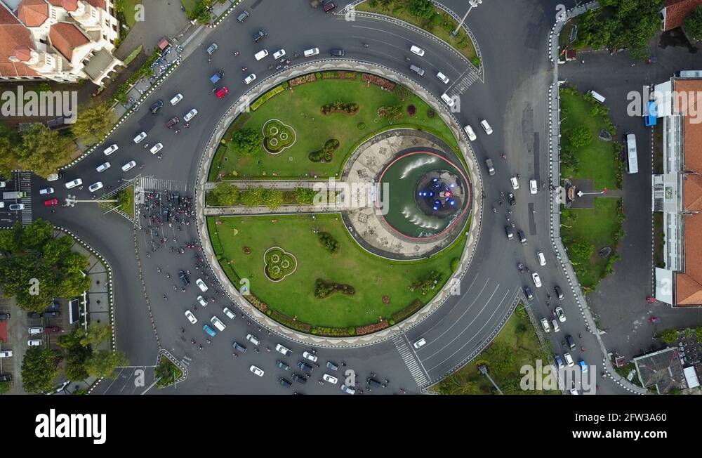 Overhead drone shot of Dutch colonial building and roundabout Indonesia ...