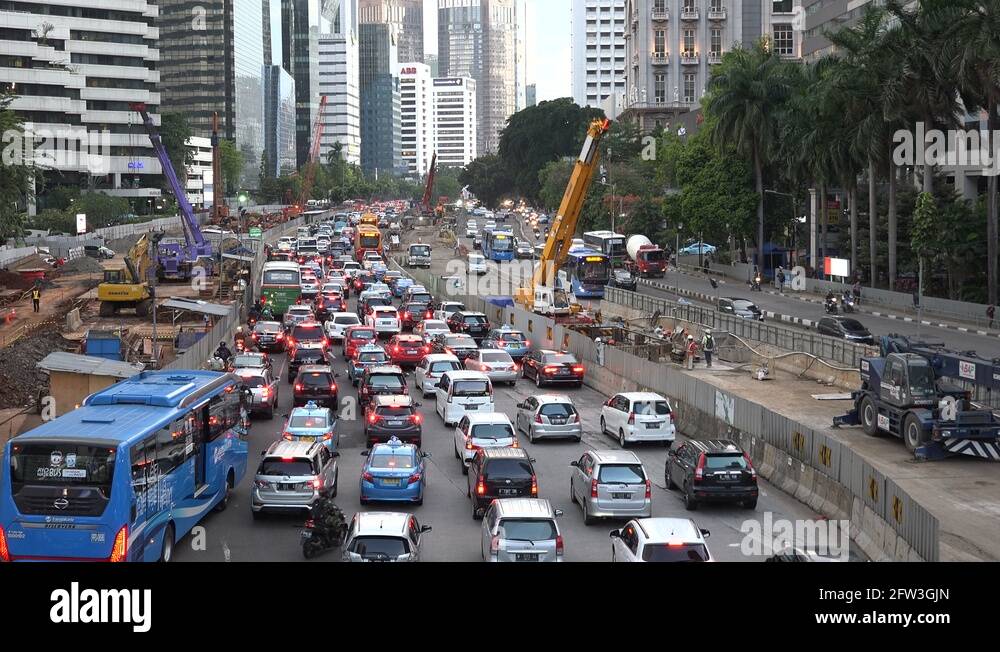 Traffic jam at road construction site in business district Jakarta ...