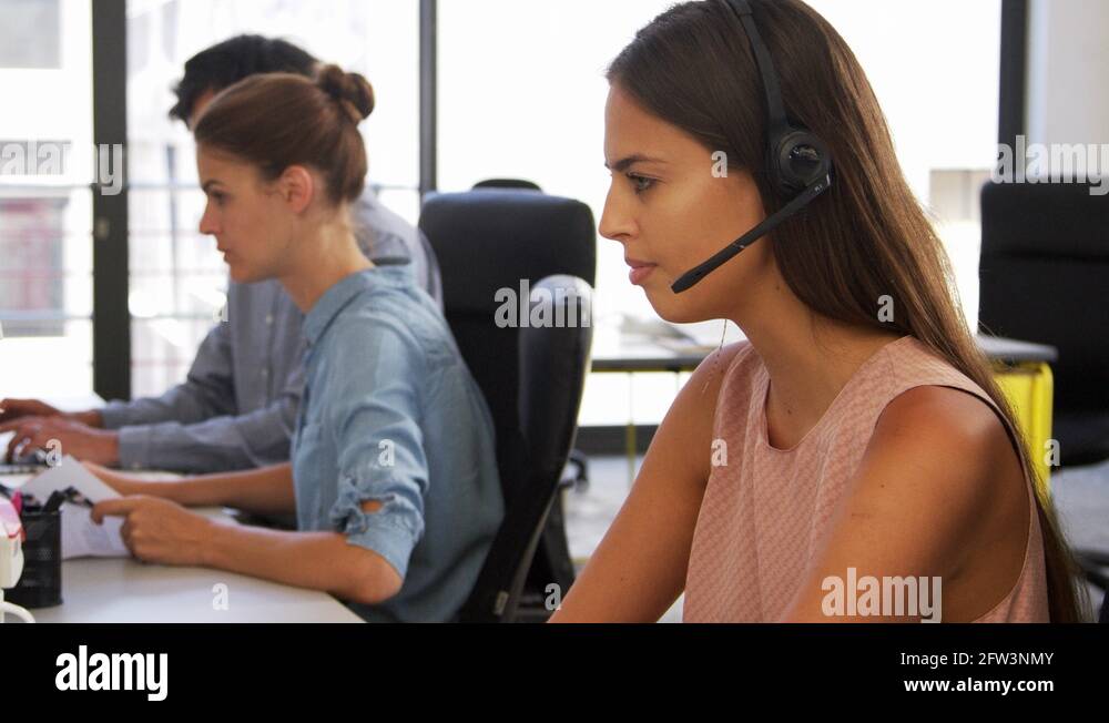 Woman wearing headset Stock Videos & Footage - HD and 4K Video Clips ...