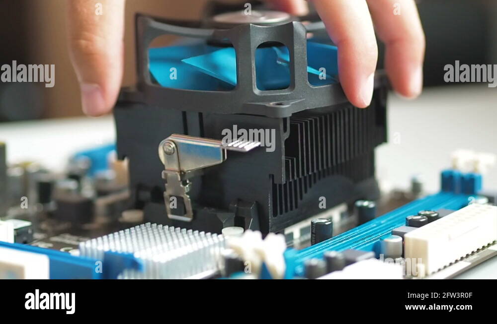 Removing And replacing Fan CPU on the motherboard. Installing and ...