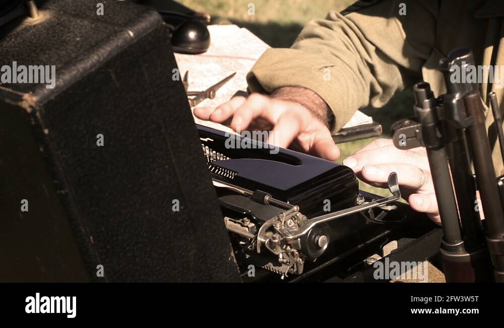 World War Two - Communications officer typing on typewriter at army ...