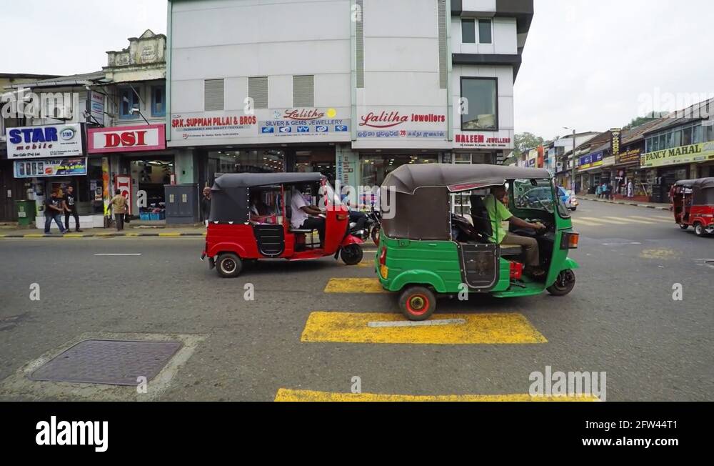 Average traffic at a typical, urban intersection in Kandy Stock Video ...