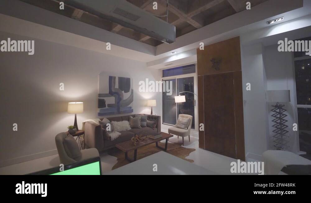 green screen laptop computer chroma key inside modern condo in downtown ...