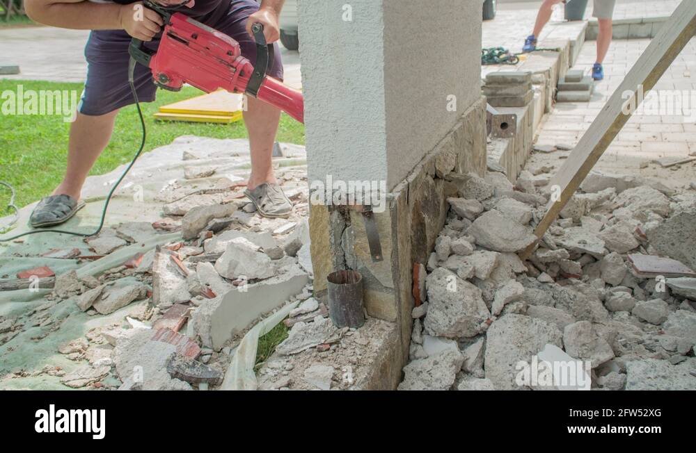Man demolishing wall Stock Videos & Footage - HD and 4K Video Clips - Alamy