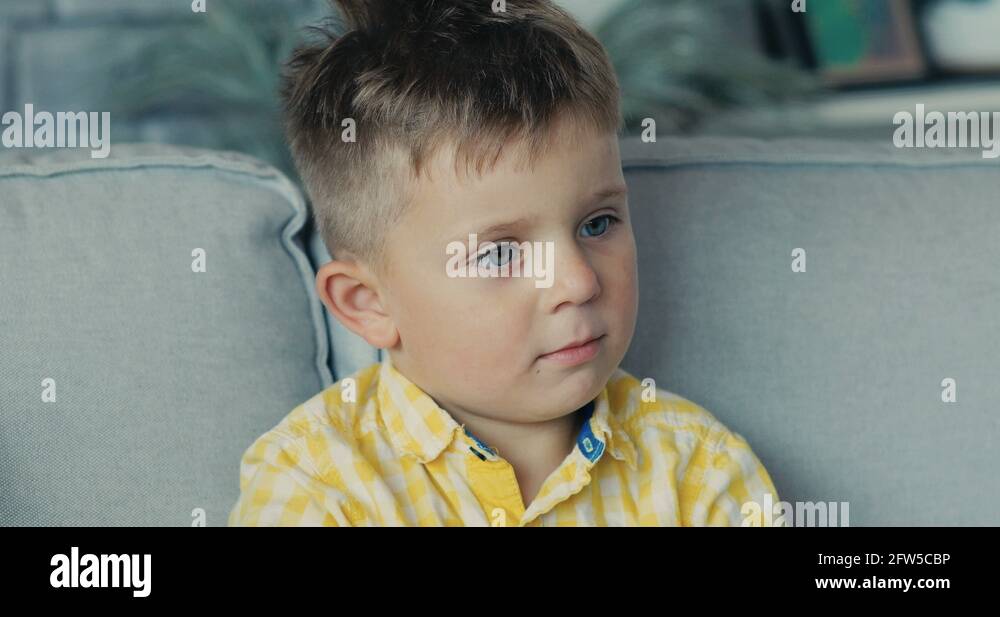 Boy looking sideways Stock Videos & Footage - HD and 4K Video Clips - Alamy
