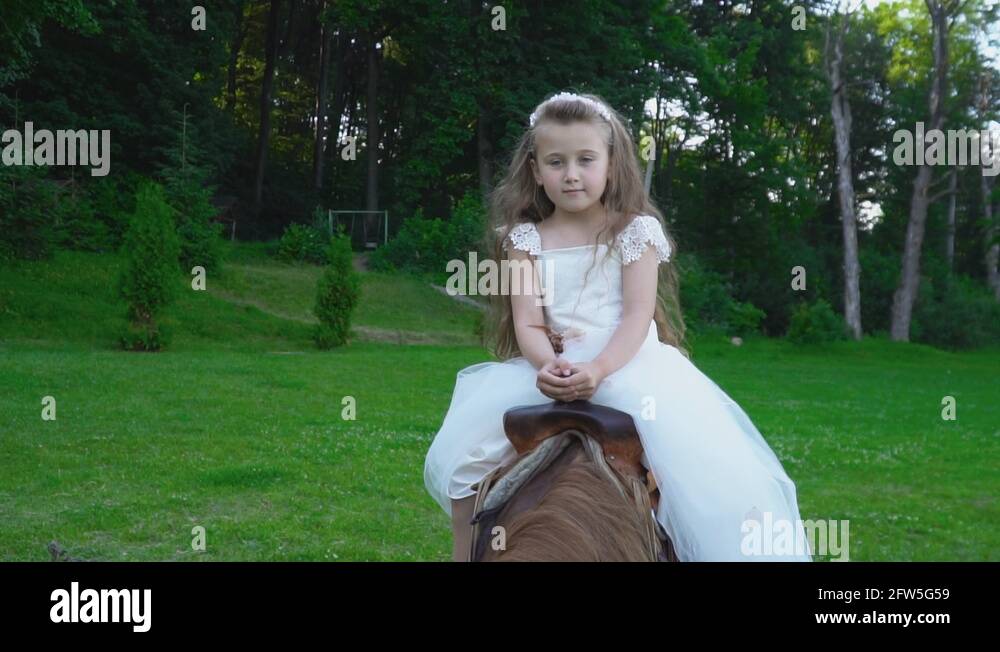 Portrait little girl riding pony Stock Videos & Footage - HD and 4K ...
