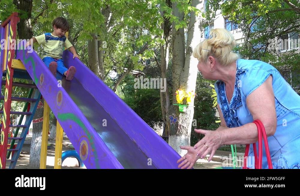 Adult support child playground Stock Videos & Footage - HD and 4K Video ...