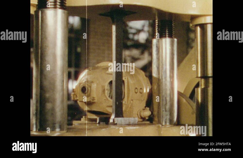 1950s: UNITED STATES: breaking point test of steel. Pencil test of ...