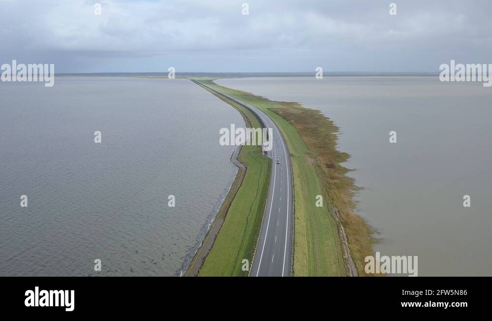 Accessroad to the island Rømø in the Danish Wadden sea national park ...