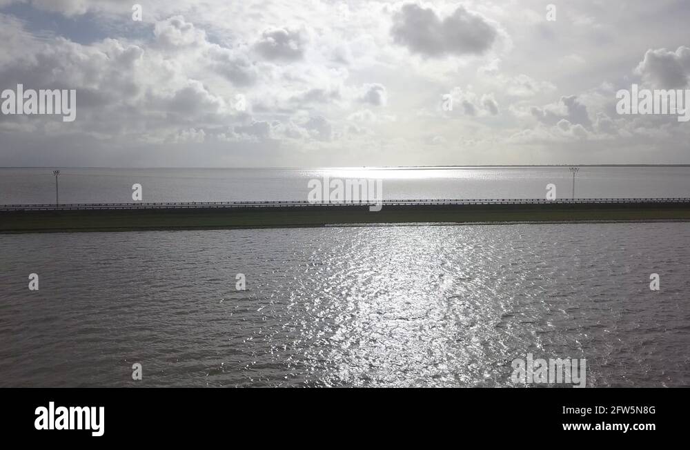 Accessroad to the island Rømø in the Danish Wadden sea national park ...