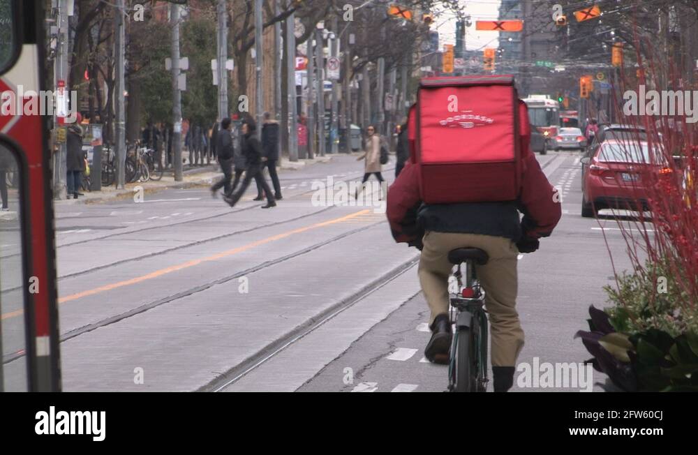 Toronto transit bike pedestrian and streetcar priority on King street ...