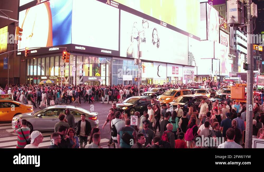 Tourists gather in downtown Times Square in evening hours 4k Stock ...