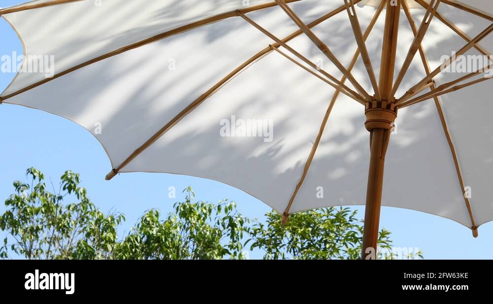White parasol Stock Videos & Footage - HD and 4K Video Clips - Alamy