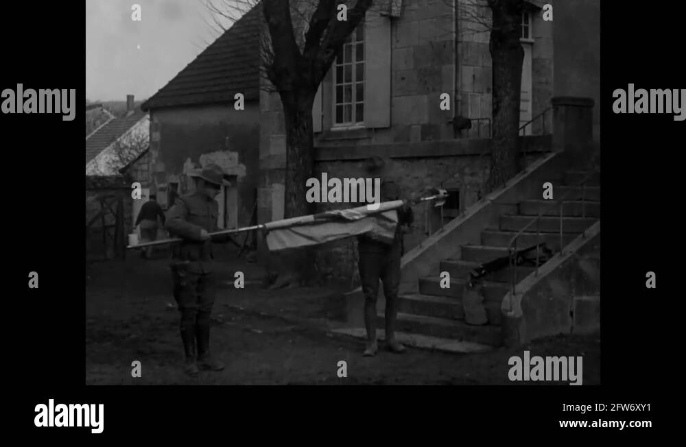 Soldiers and army officers gathering together for rainbow division flag ...