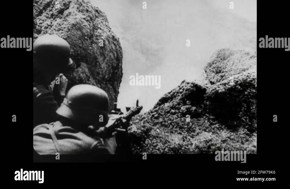Military soldiers attacking towards the enemy with loaded rifles - 1944 ...