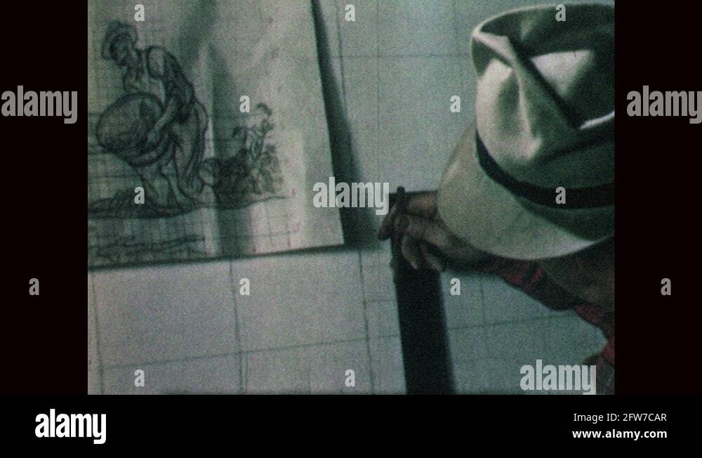 1940s Man Wearing Fedora Uses L Square To Draw Grid Within Grid On Canvas Man Stock Video 