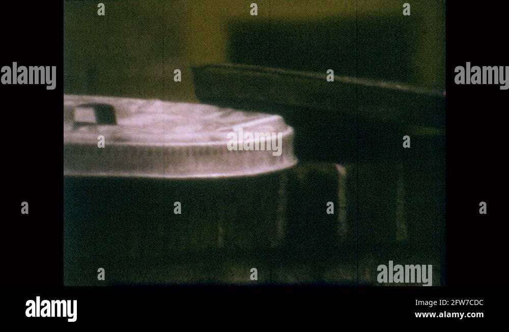 1970s: Garbage cans and lids in a row. Garbage cans in alley. Empty ...