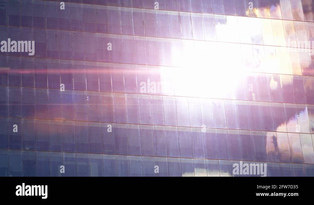 Glass Office Building Window Reflection of Sky and Sun Lens Flare Stock ...