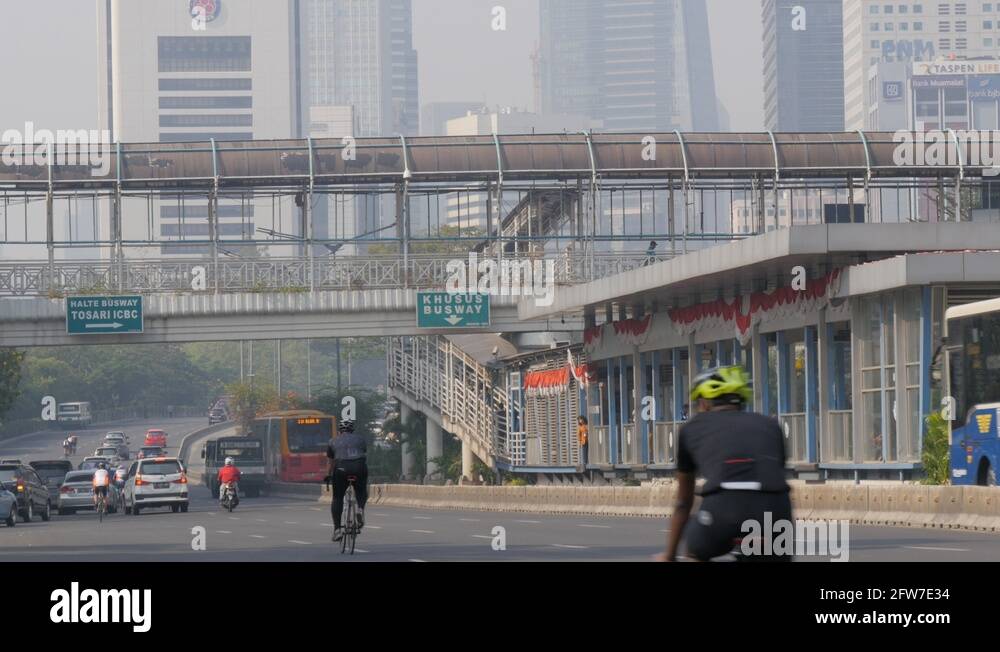 Metro bus station with bus arriving in Jakarta Java Indonesia Stock ...