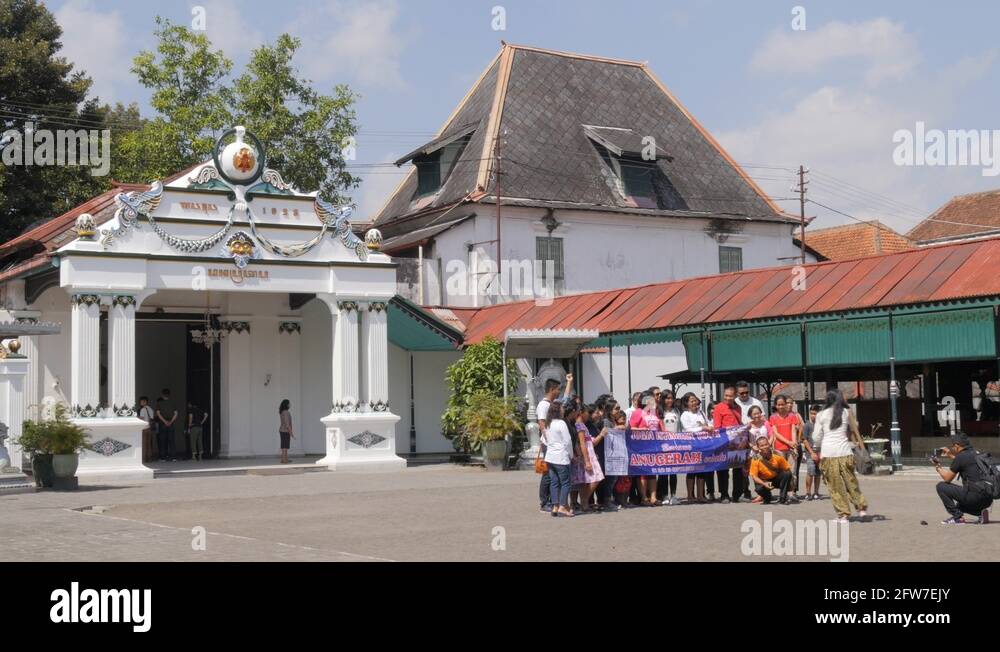 Tourists making group photo in Keraton palace in Yogyakarta Java ...
