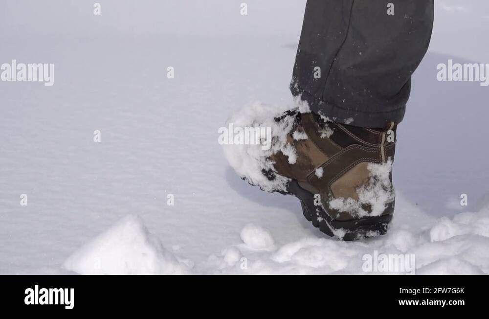 Man foot sinking into the high snow in slow motion Stock Video Footage ...