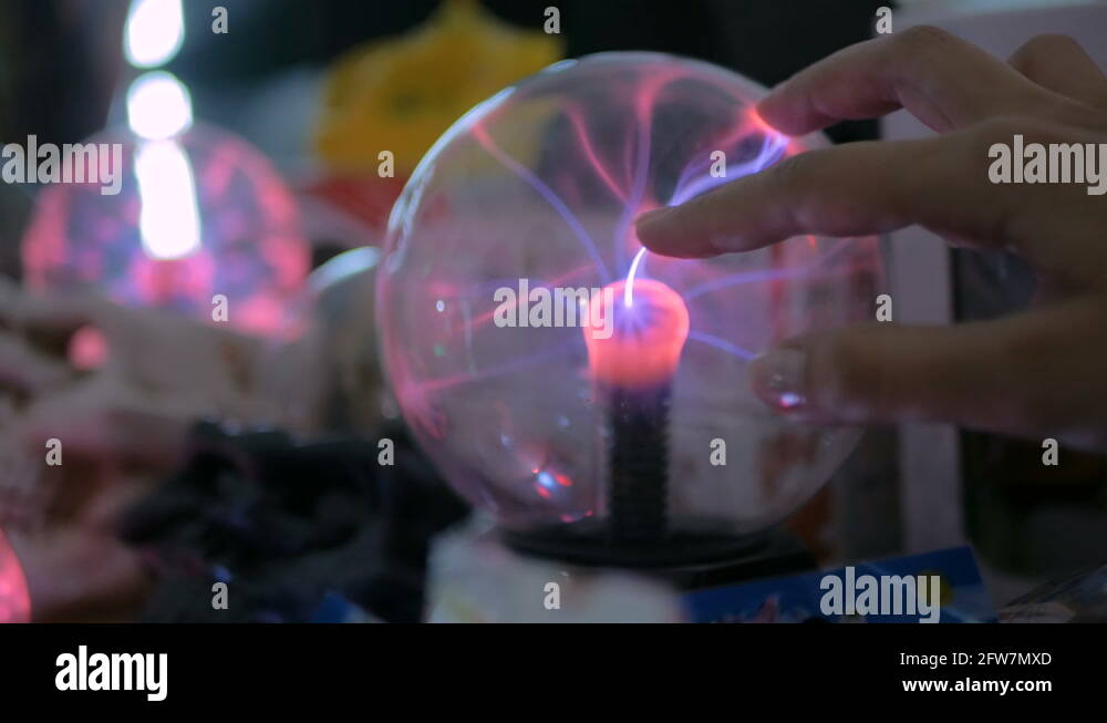 Plasma ball woman Stock Videos & Footage - HD and 4K Video Clips - Alamy
