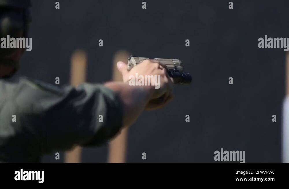 Cadet implementing hand gestures and gun handling skills on target ...