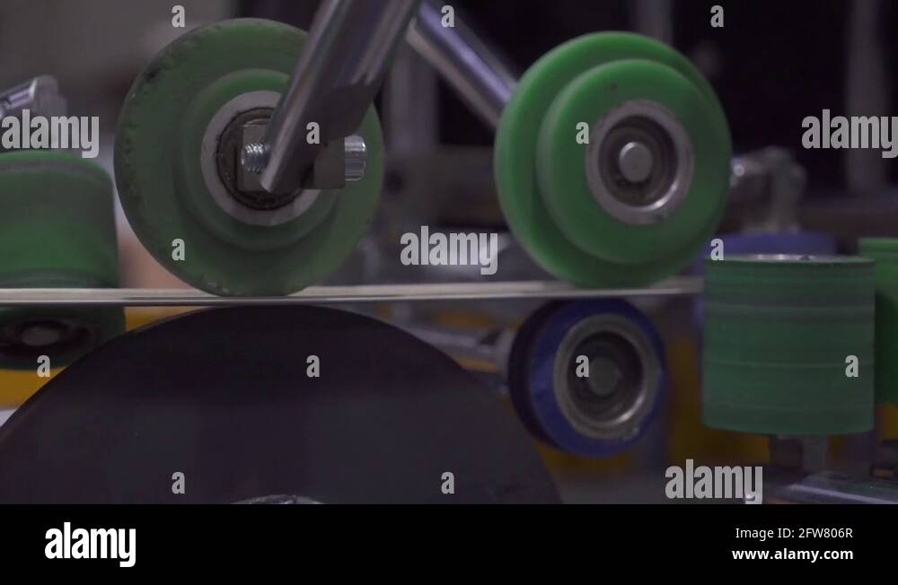 Industrial machine, view of rotating rollers and wheels, production ...