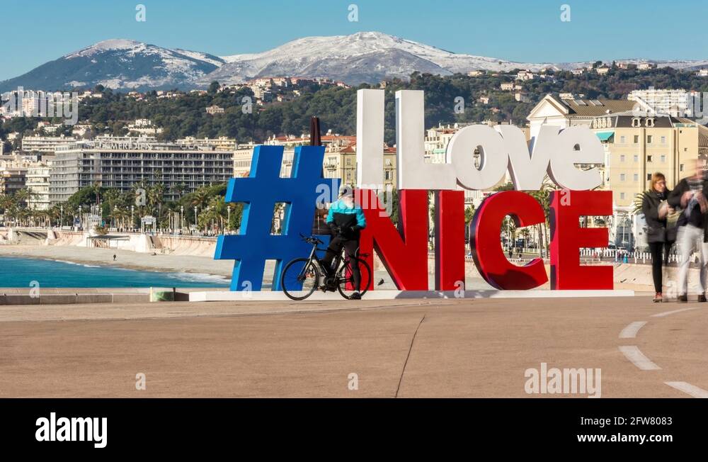"I love Nice" sign in French national flag colors and Nice city skyline ...