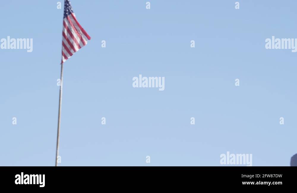 Old west rail road pan from flag to train sign Stock Video Footage - Alamy