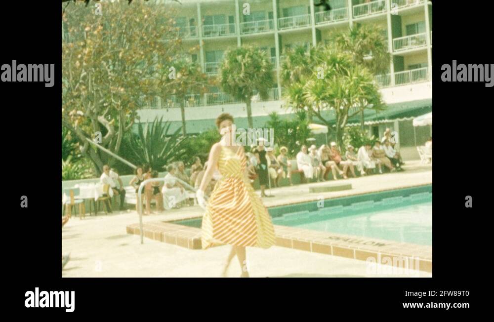 Woman pool dress Stock Videos & Footage - HD and 4K Video Clips - Alamy