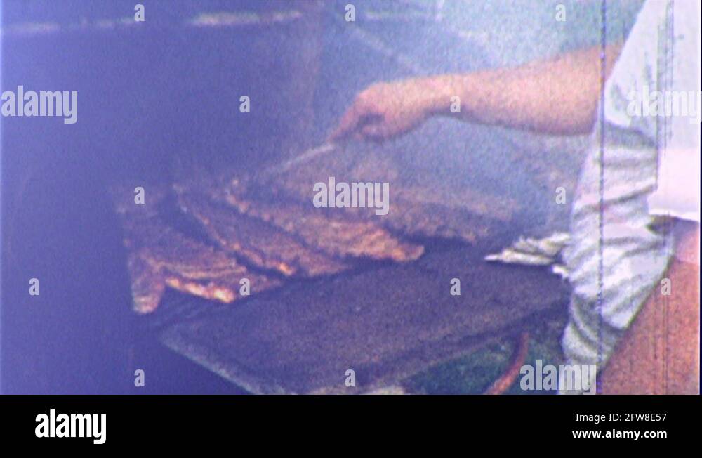1950s Man Cooks BBQ Backyard Barbecue Ribs Smoked Meat Vintage Film ...